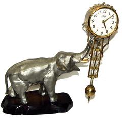 Swing Arm Clock; Japan, Fuji Clock Co, Elephant, 8-Day, 11 inch.