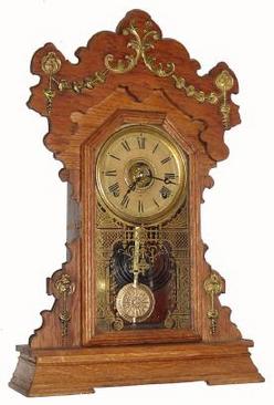 Shelf Clock; Seth Thomas, Gingerbread, Metals Series, 23 inch.