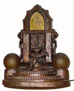 Novelty Clock; Lux, Art Deco, Jester, 3-Amber Globes, 14 inch.