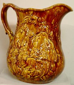 Rockingham Pottery; Pitcher, Hunter with Dogs, 9 inch.