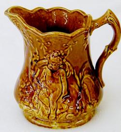Rockingham Pottery; Pitcher, Cherubs, 7 inch.