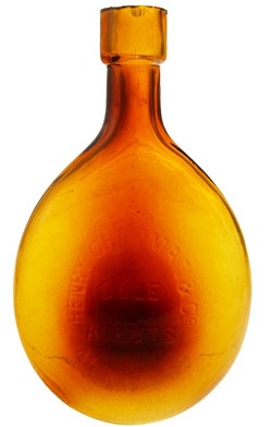 Flask; Henry Chapman & Co Sole Agents, Montreal, Golden Amber, 6 inch.
