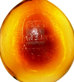 Flask; Henry Chapman & Co Sole Agents, Montreal, Golden Amber, 6 inch.