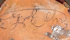 George Ohr Pottery; Puzzle Mug, Mottled Brown Glaze, 4 inch.