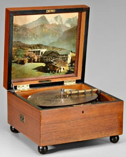 Music Box; Rettig (Max), Disc (9 1/8 inch), 3.50 Comb, Mahogany, 27 Discs.