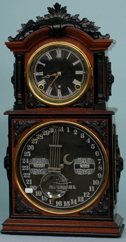Calendar Clock; Ithaca, Parlor No 3 1/2, Double Dial, Walnut, 20 inch.