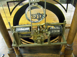 Calendar Clock; Ithaca, Skeleton, Welch 1870 Movement, Glass Dome, 25 inch.