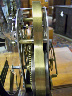 Calendar Clock; Ithaca, Skeleton, Welch 1870 Movement, Glass Dome, 25 inch.